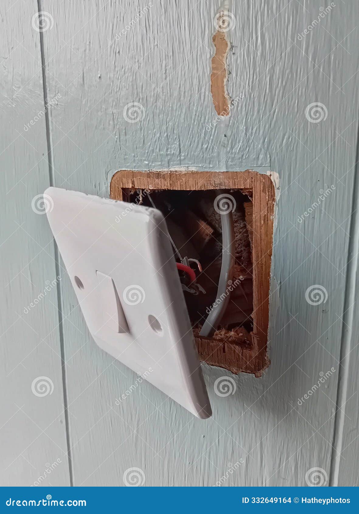 Light Switch Hanging Off Wall Showing Exposed Wiring Behind it Stock ...