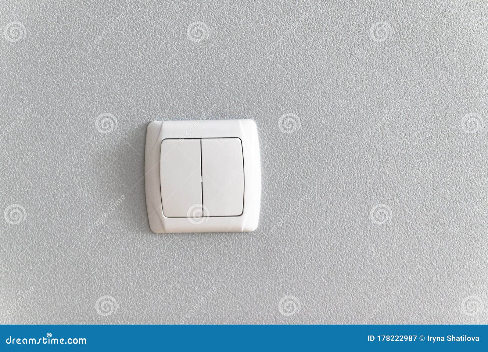 Light Switch, a White Plastic Mechanical Switch Mounted on a Gray Wall ...