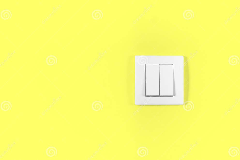 Light Switch on Yellow Wall. Electricity and Light Symbol Stock Image ...