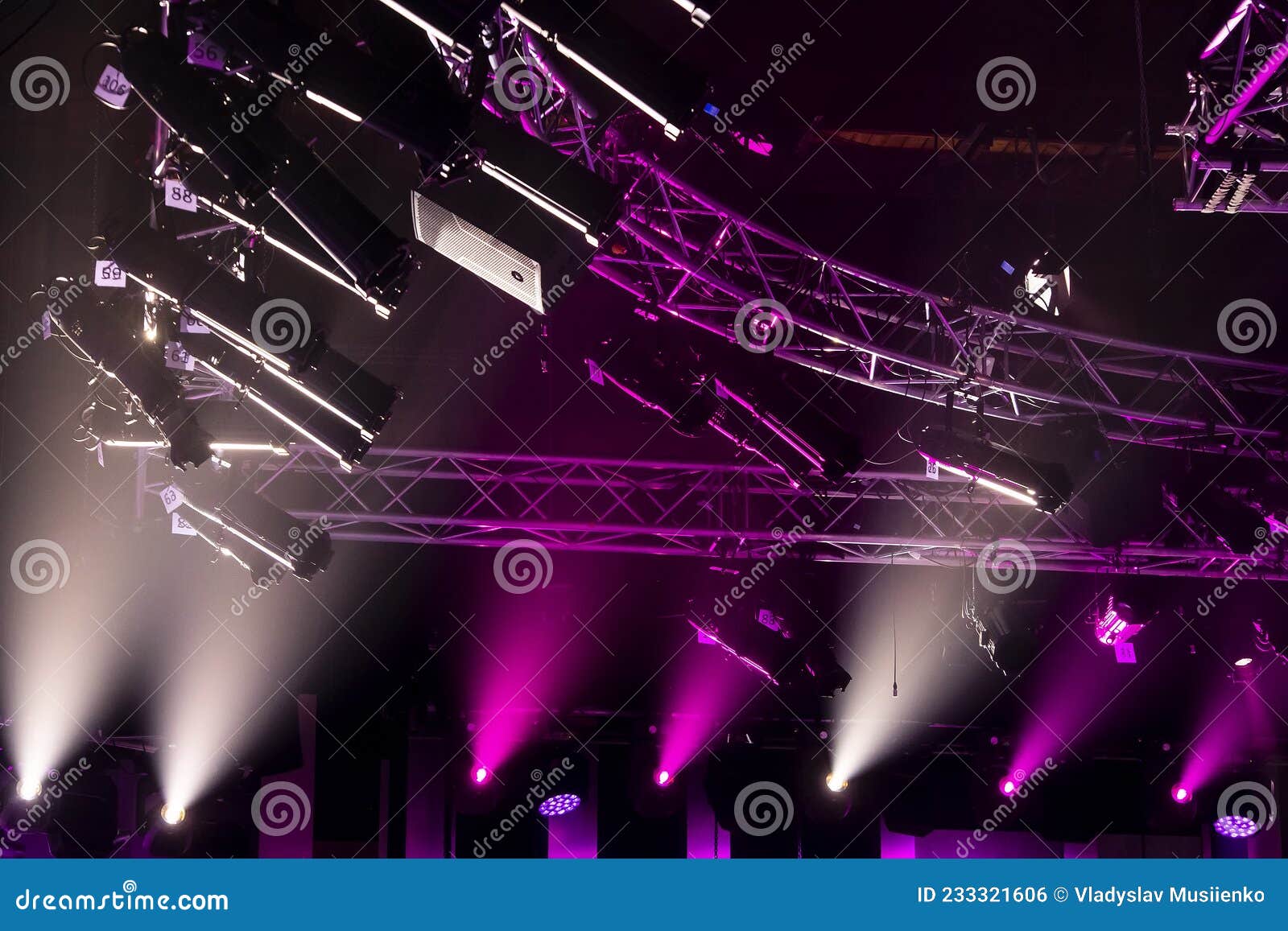 Light Systems with Colored Spotlights Mounted on Metal Structures in a ...