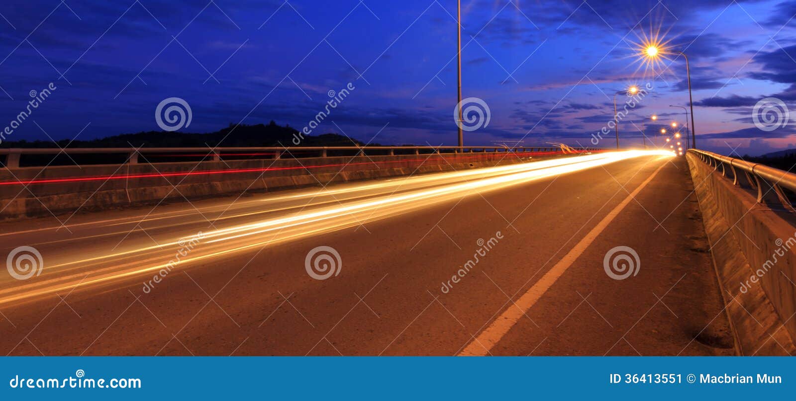 Light trails at blue hour stock image. Image of automobile - 36413551
