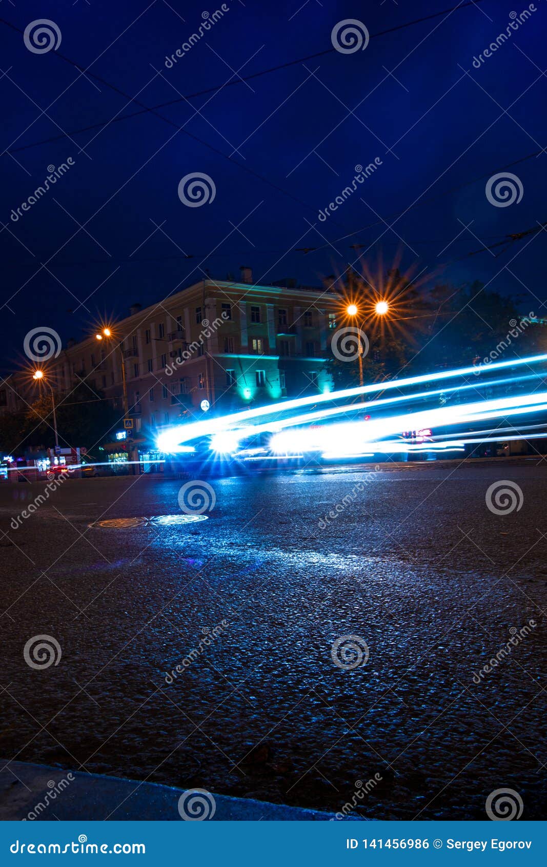 Light Trails of a Car Turning on the Crossroad Wide Angle Stock Photo ...