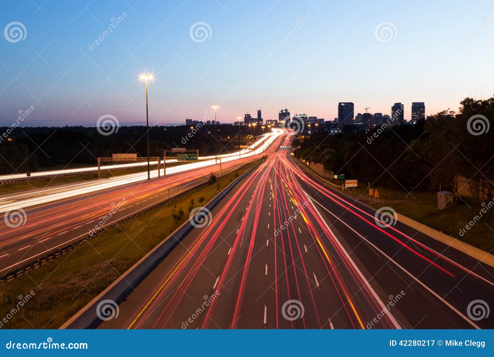 Light Trails on a Motorway at Dusk Stock Image - Image of blue ...