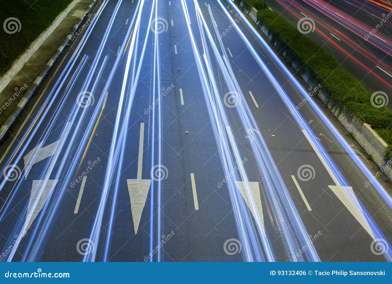 Light Trails Over Traffic Signs at Night Stock Photo - Image of arrows ...