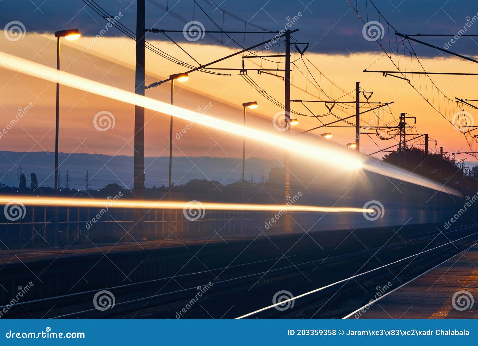 Light Trails of Passenger Train Stock Photo - Image of platform, dawn ...