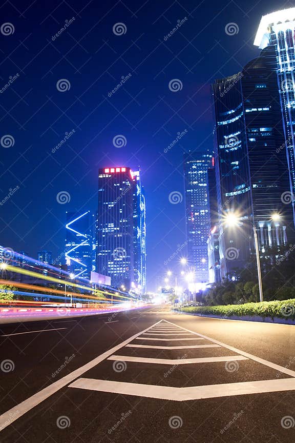 Light Trails on the Ramp with Building Background Stock Image - Image ...