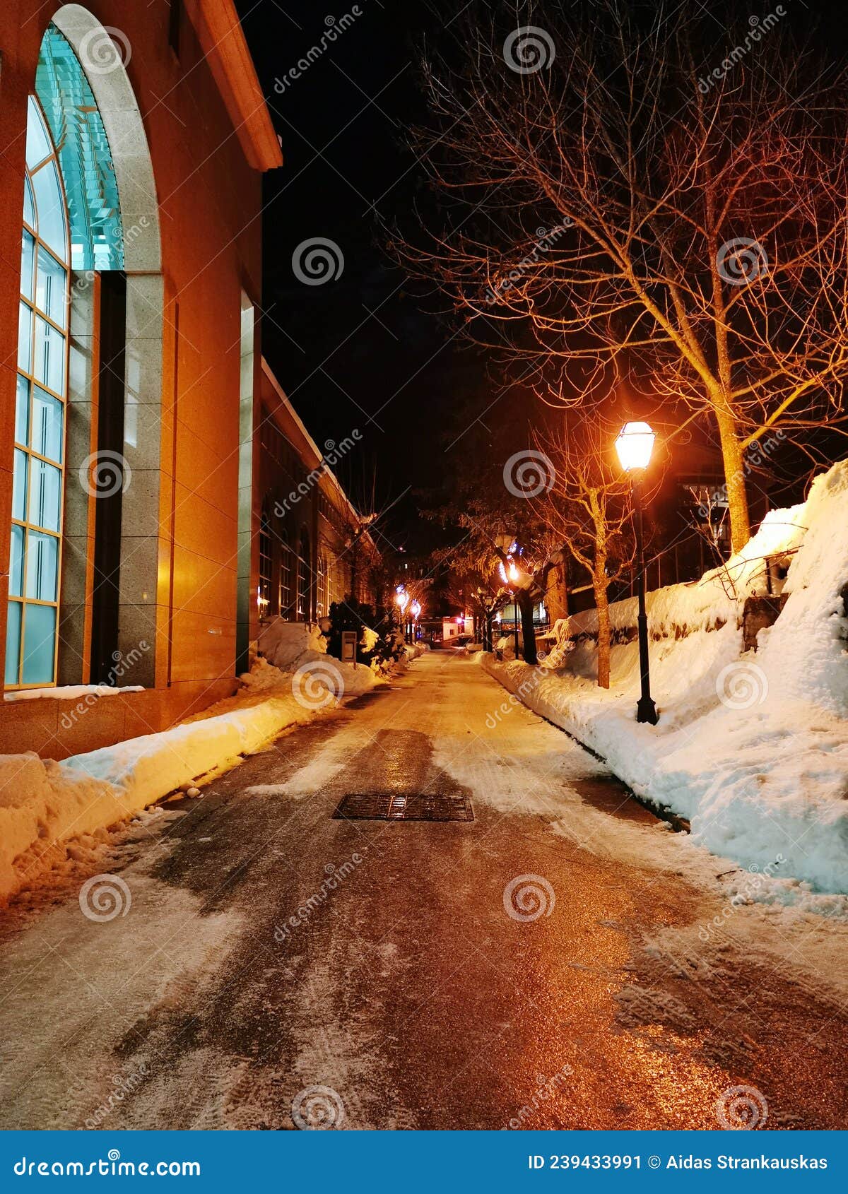 Light up street with snow stock image. Image of streetlight - 239433991