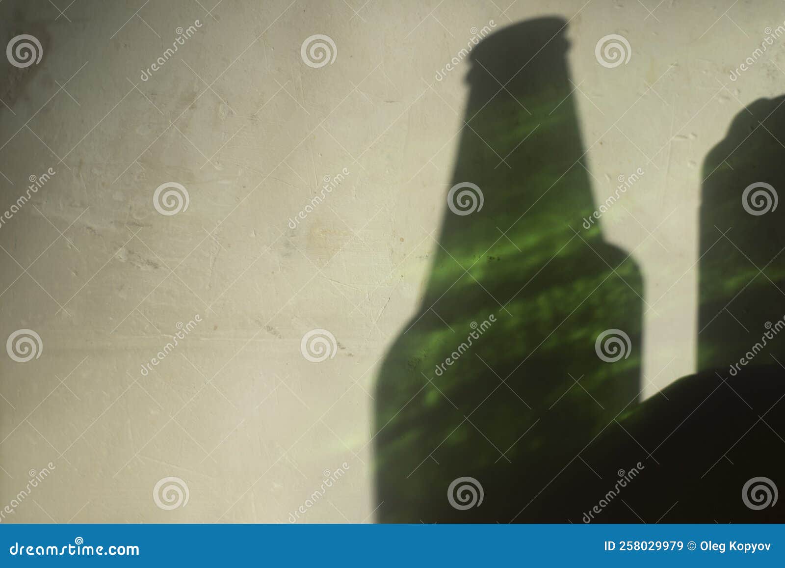Light on Wall from Bottle of Beer. Green Glass and Shadow on Wall Stock ...