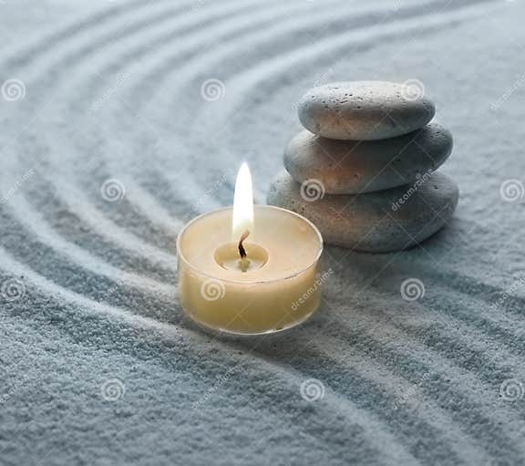 Light Warm Candle and Stone on Sand Stock Image - Image of natural ...
