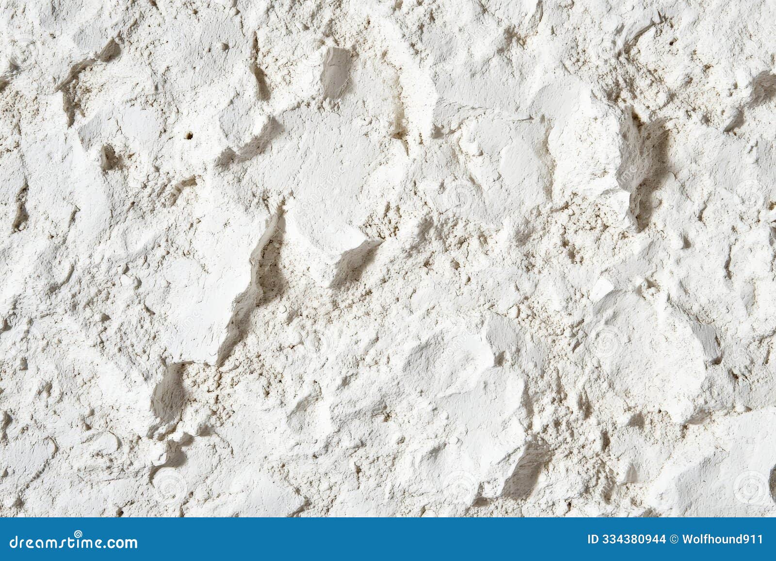 A Light White Textured Surface with a Rough, Stone-like Finish ...