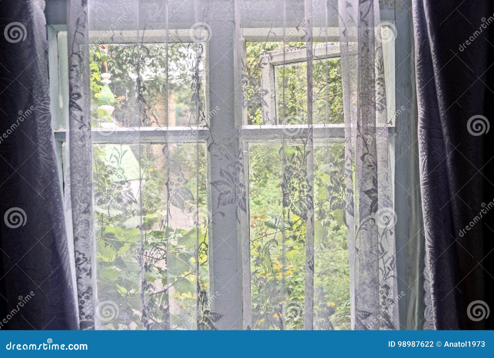 The Window in the Room is Covered with a Transparent Curtain Stock ...