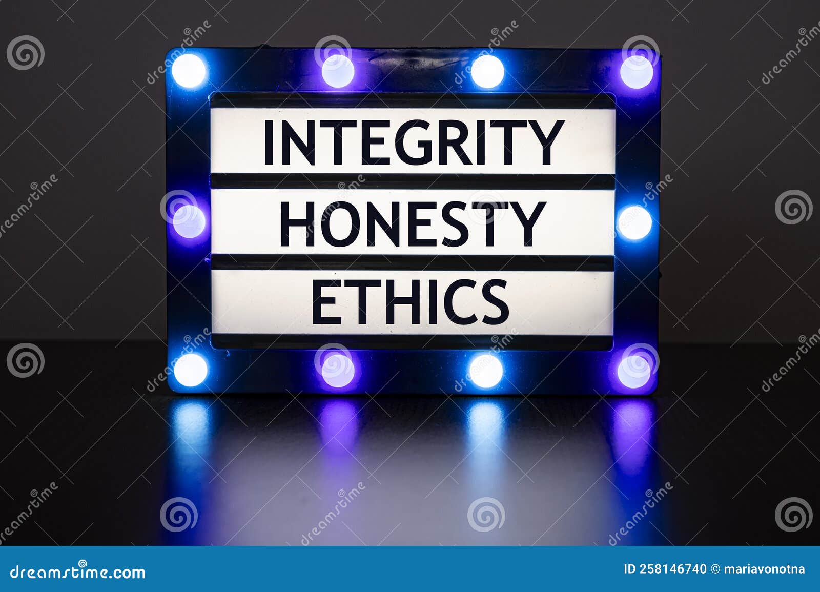 Lightbox with Blue Lights in Dark Room with Words - Integrity, Honesty ...