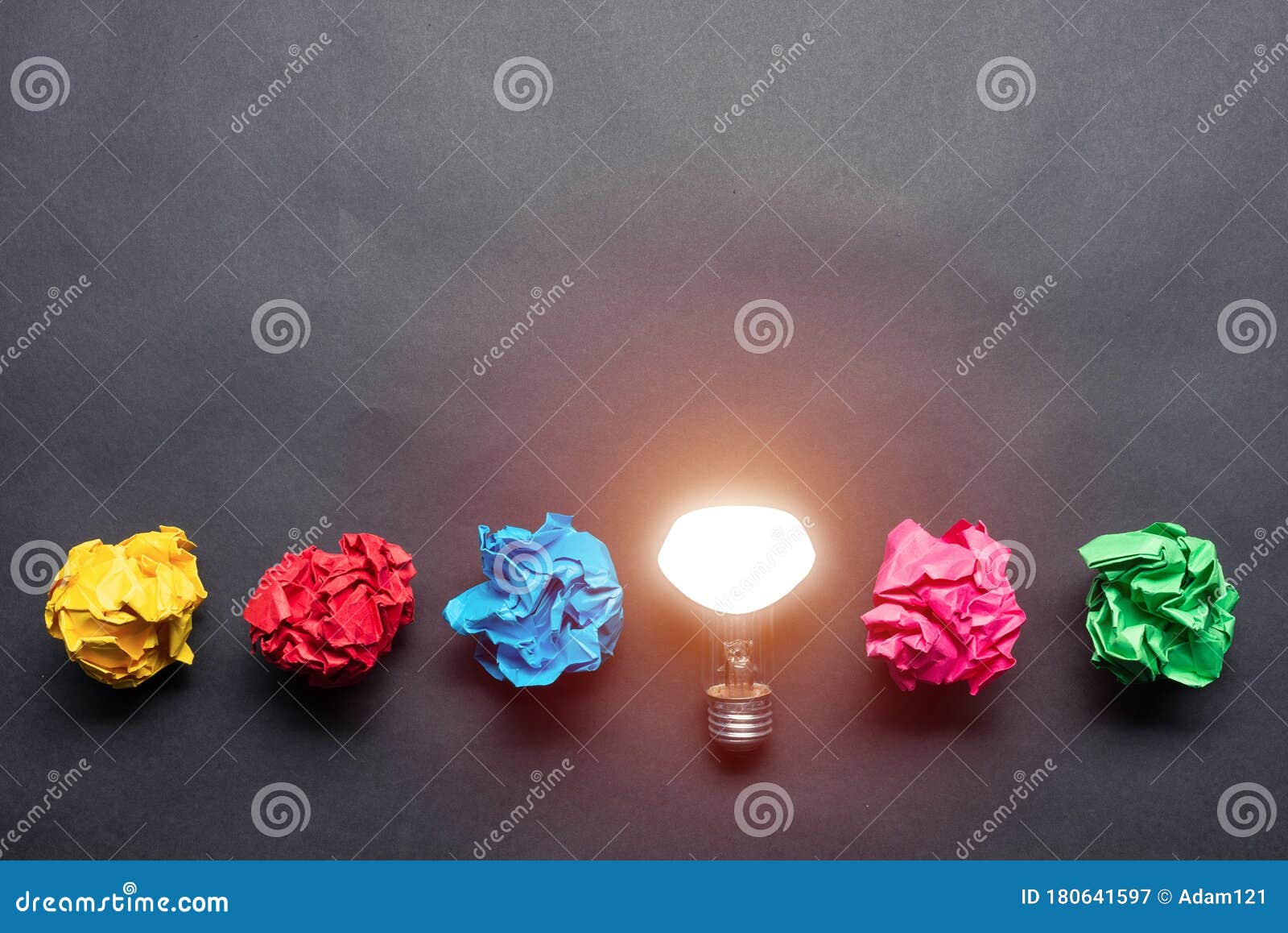 Lightbulb and Crumpled Colorful Paper Balls Stock Image - Image of ...