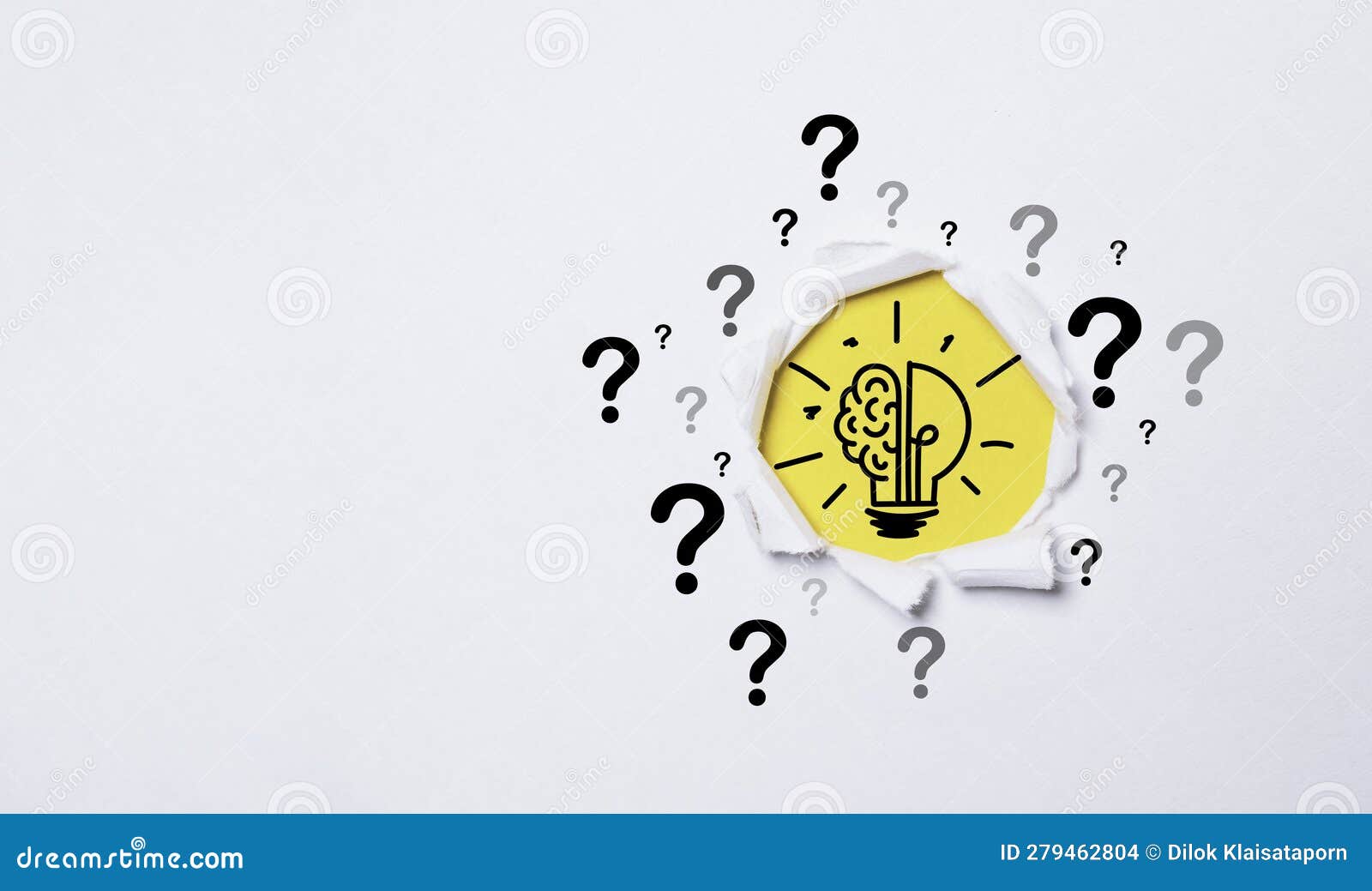 Lightbulb Drawing Inside of Punch Paper with Questions Mark for Creative Thinking Idea and ...