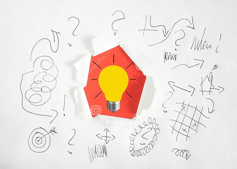 Lightbulb Inside of Punch Paper with Scribble and Question Marks for ...