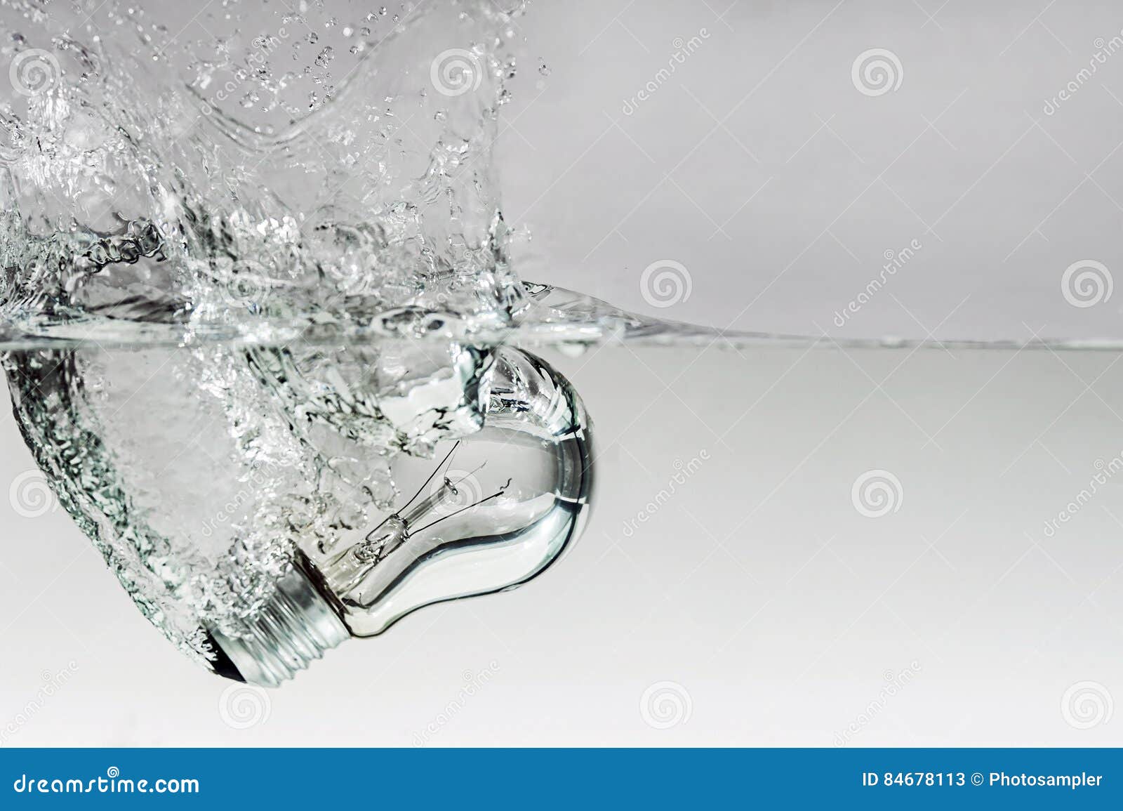 Lightbulb in water stock image. Image of splash, bright - 84678113