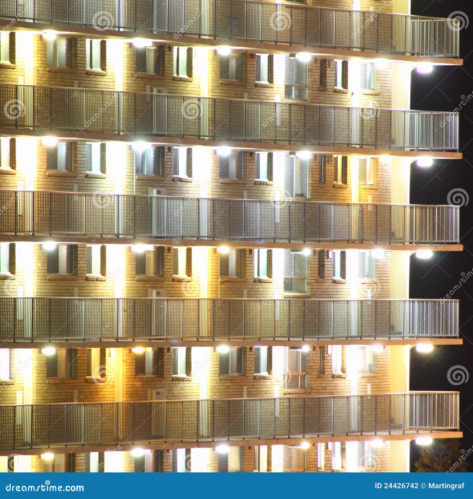 Lighted Apartment Block Facade with Balconies Night Scene Stock Photo ...