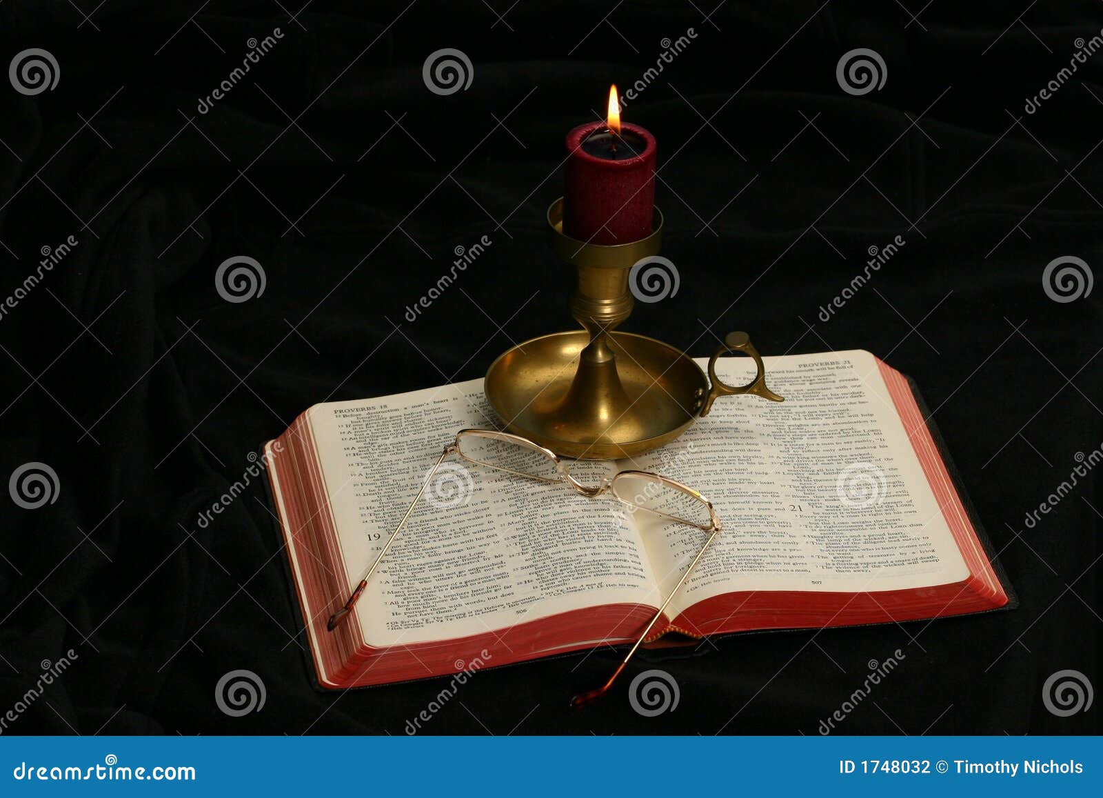 Lighted Candle on Open Bible -- Whole Bible Visible Stock Photo - Image ...