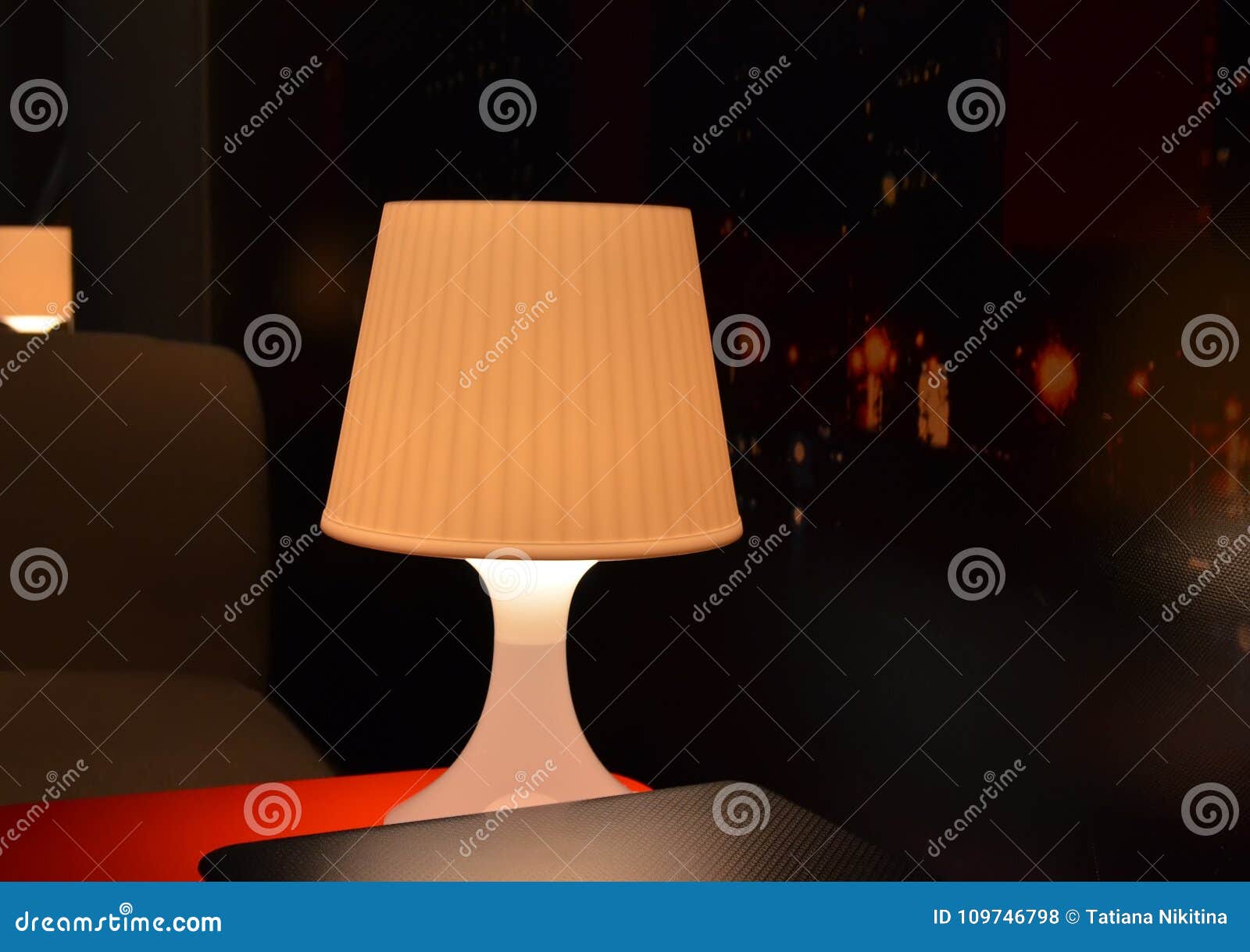 Lighted Lamp on the Red Table Stock Photo - Image of dining, laptop ...