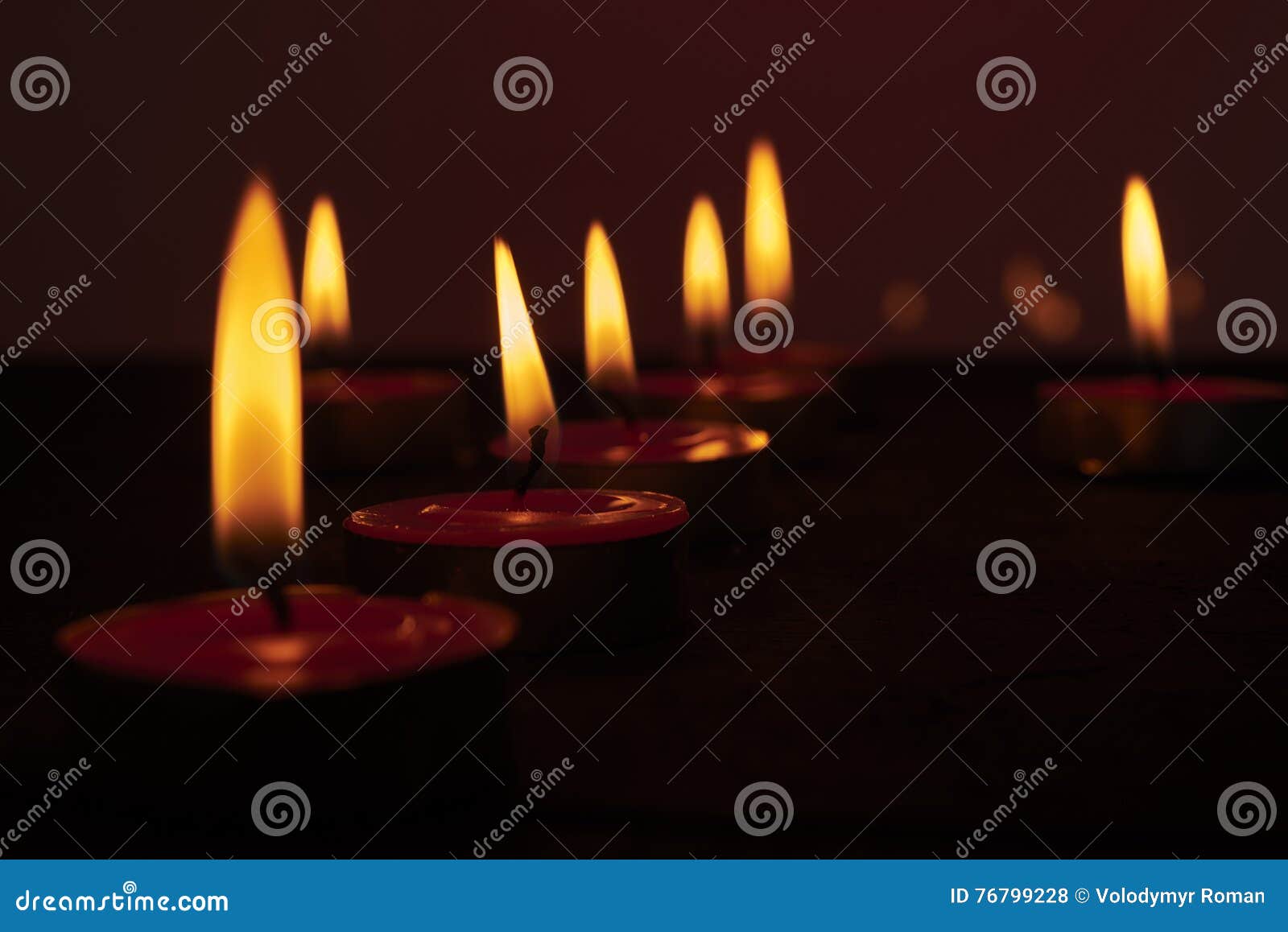 Lighted Many Candles on a Dark Background Stock Photo - Image of cross ...