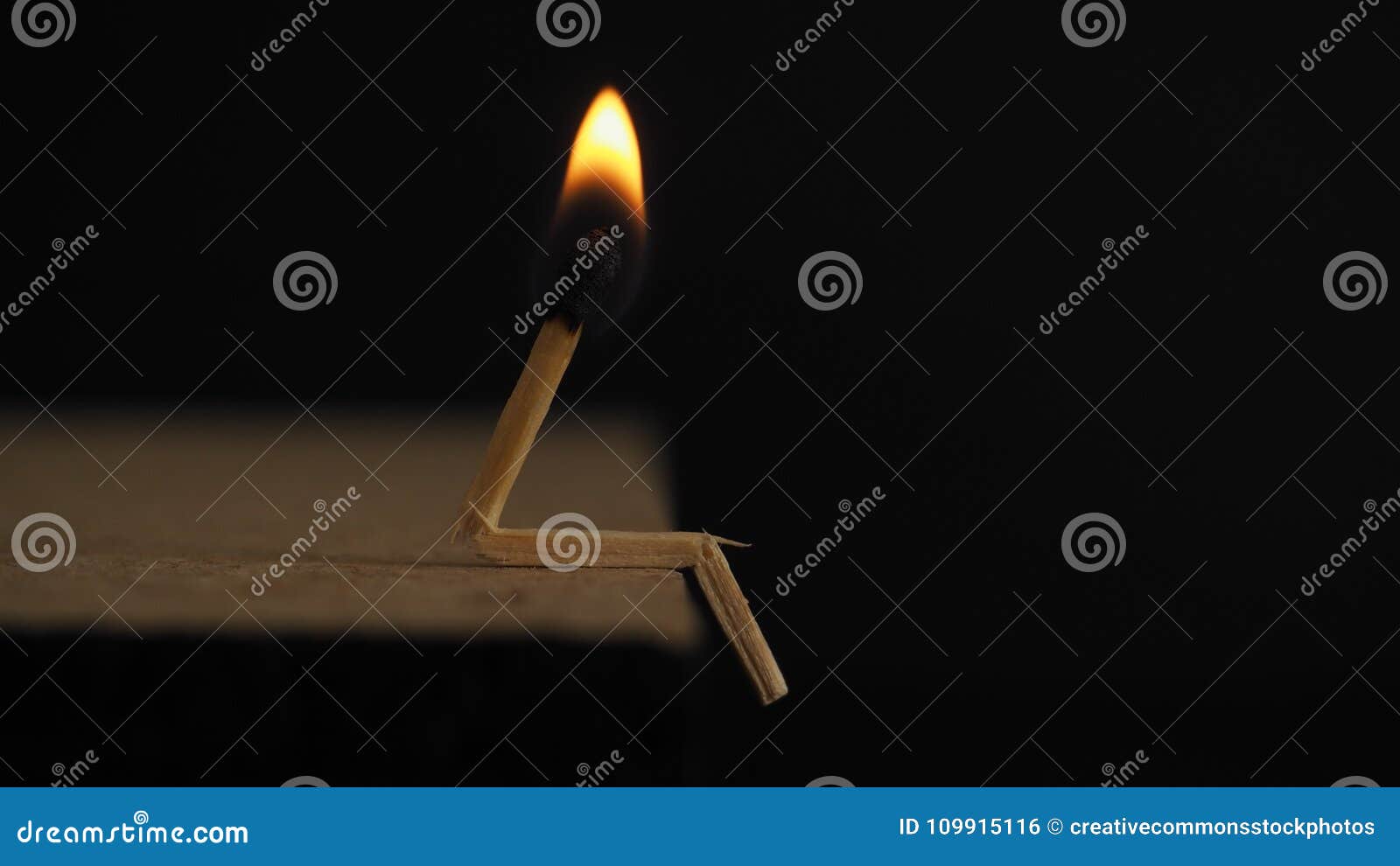 Lighted Matchstick On Brown Wooden Surface Picture. Image: 109915116