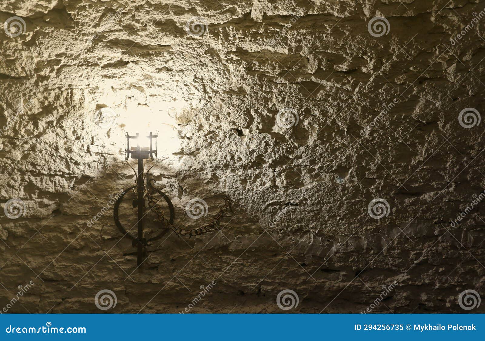 Lighted Medieval Castle Torch Hanging on a Stone Wall, Vintage Objects ...