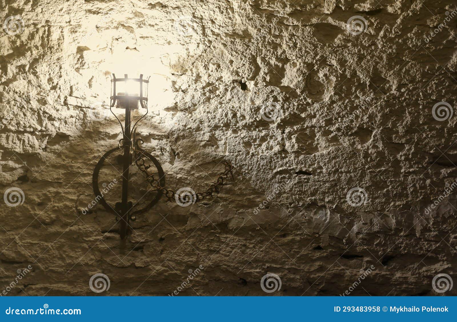 Lighted Medieval Castle Torch Hanging on a Stone Wall, Vintage Objects ...