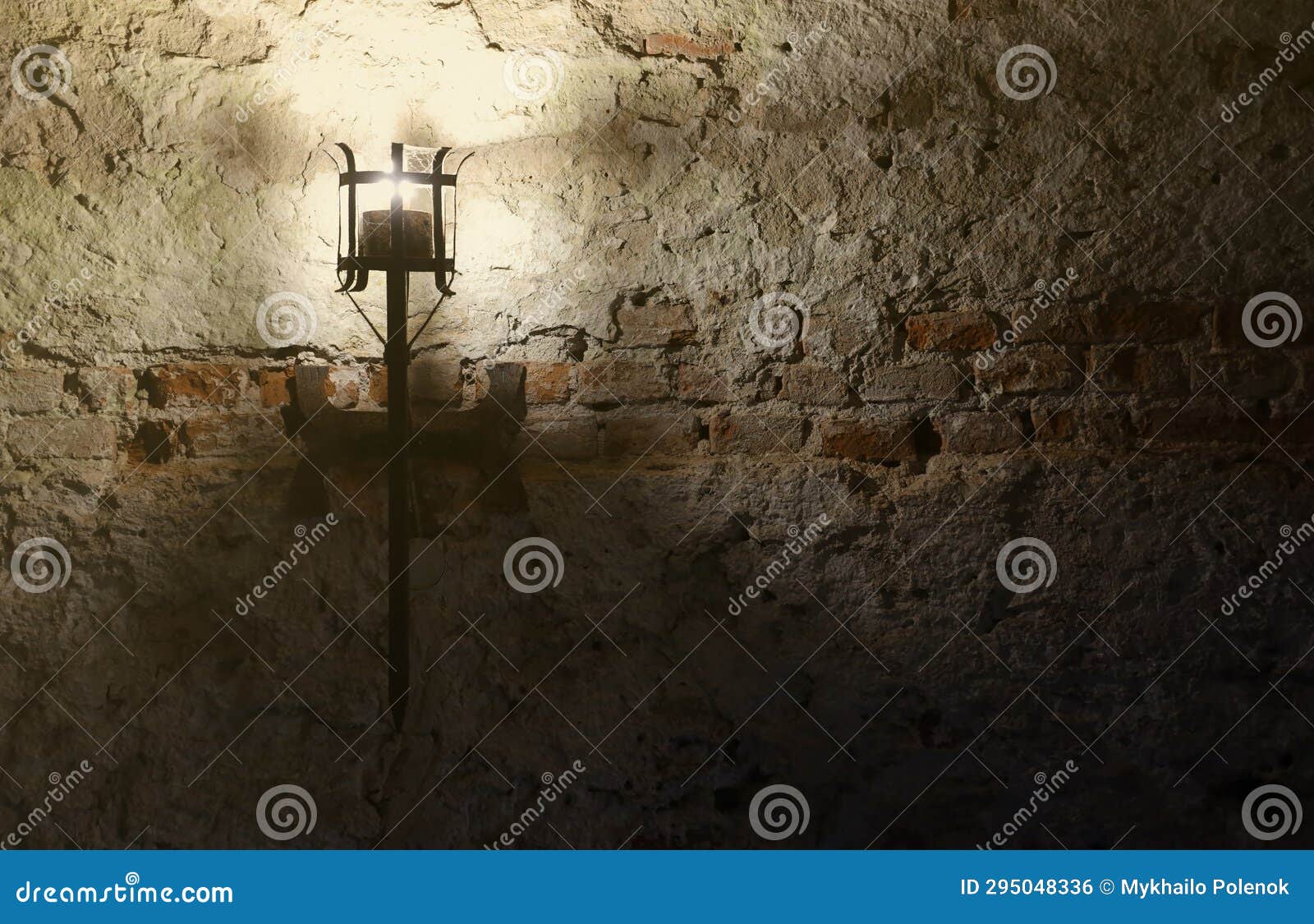 Lighted Medieval Castle Torch Hanging on a Stone Wall, Vintage Objects ...