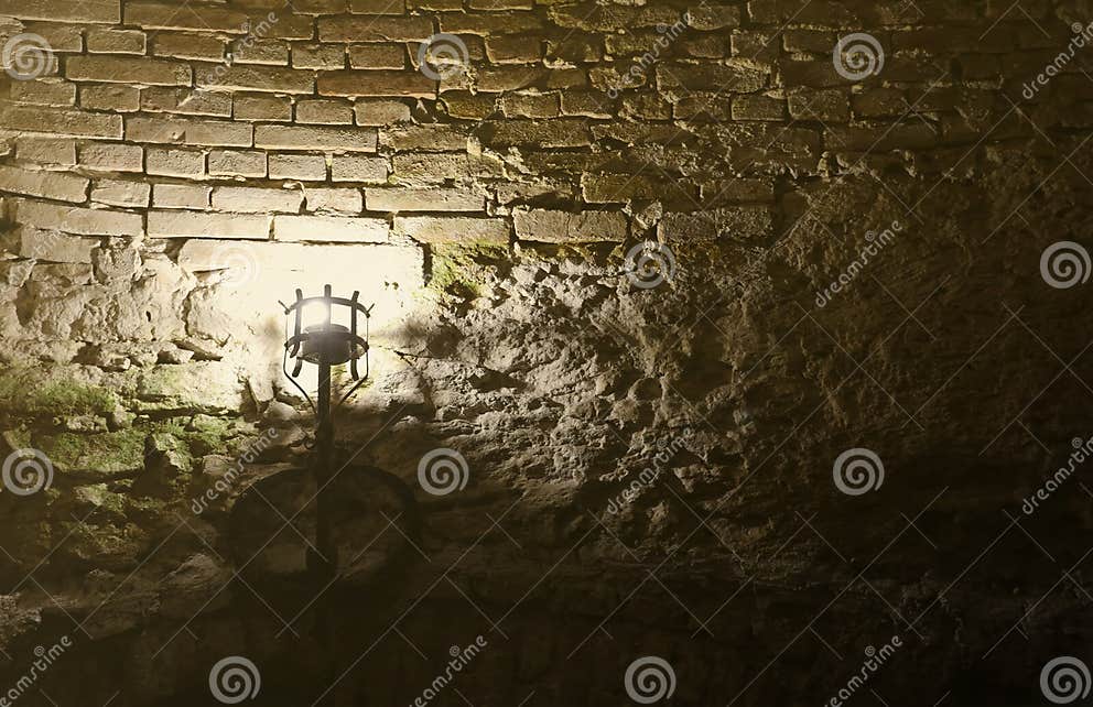 Lighted Medieval Castle Torch Hanging on a Stone Wall, Vintage Objects ...