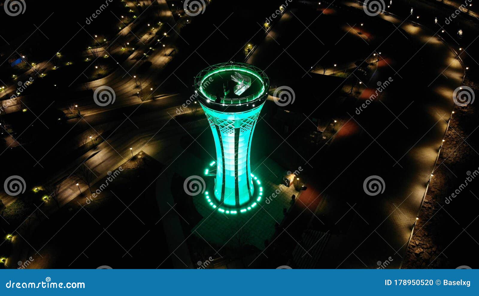 Lighted Tower in the Park Surrounded by Road Light Stock Photo - Image ...