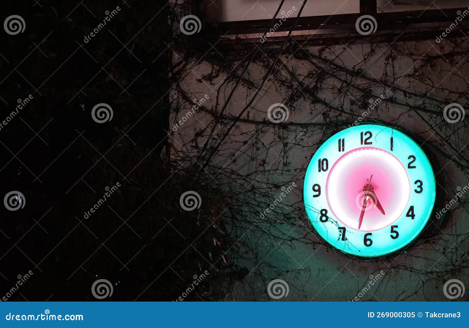 Lighted wall clock stock image. Image of lighted, clock - 269000305