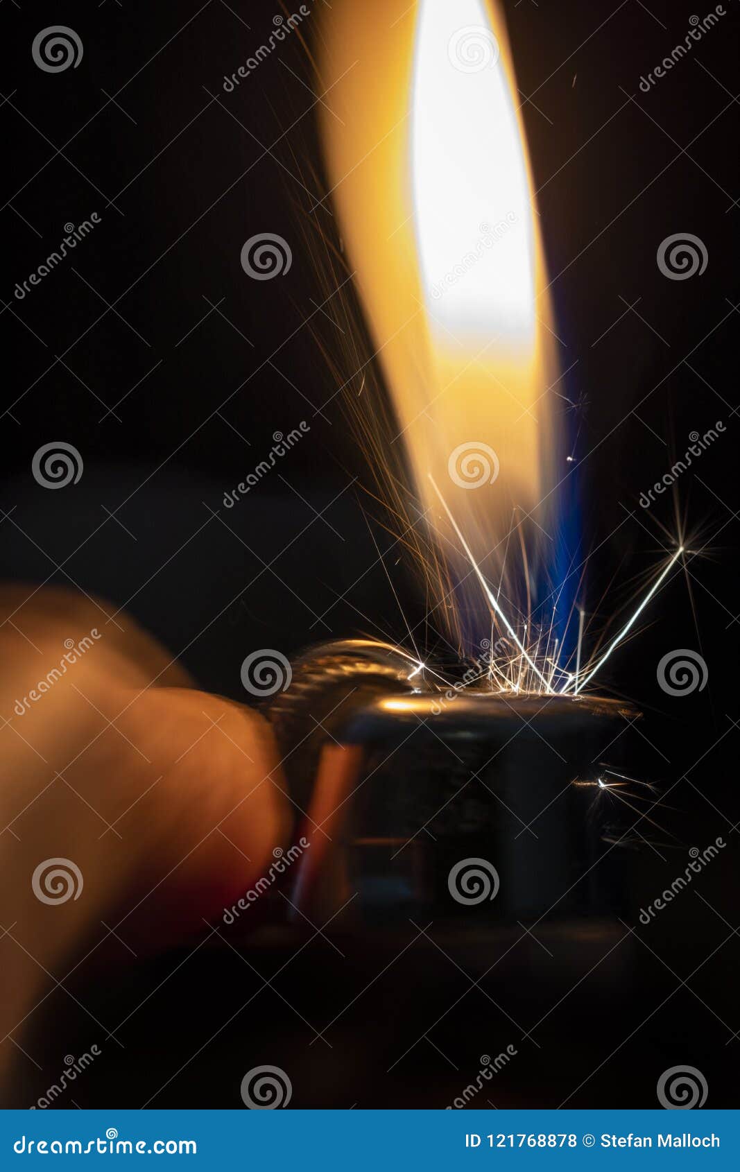 A Lighter Being Lit In The Dark Stock Photo - Image of beauty ...