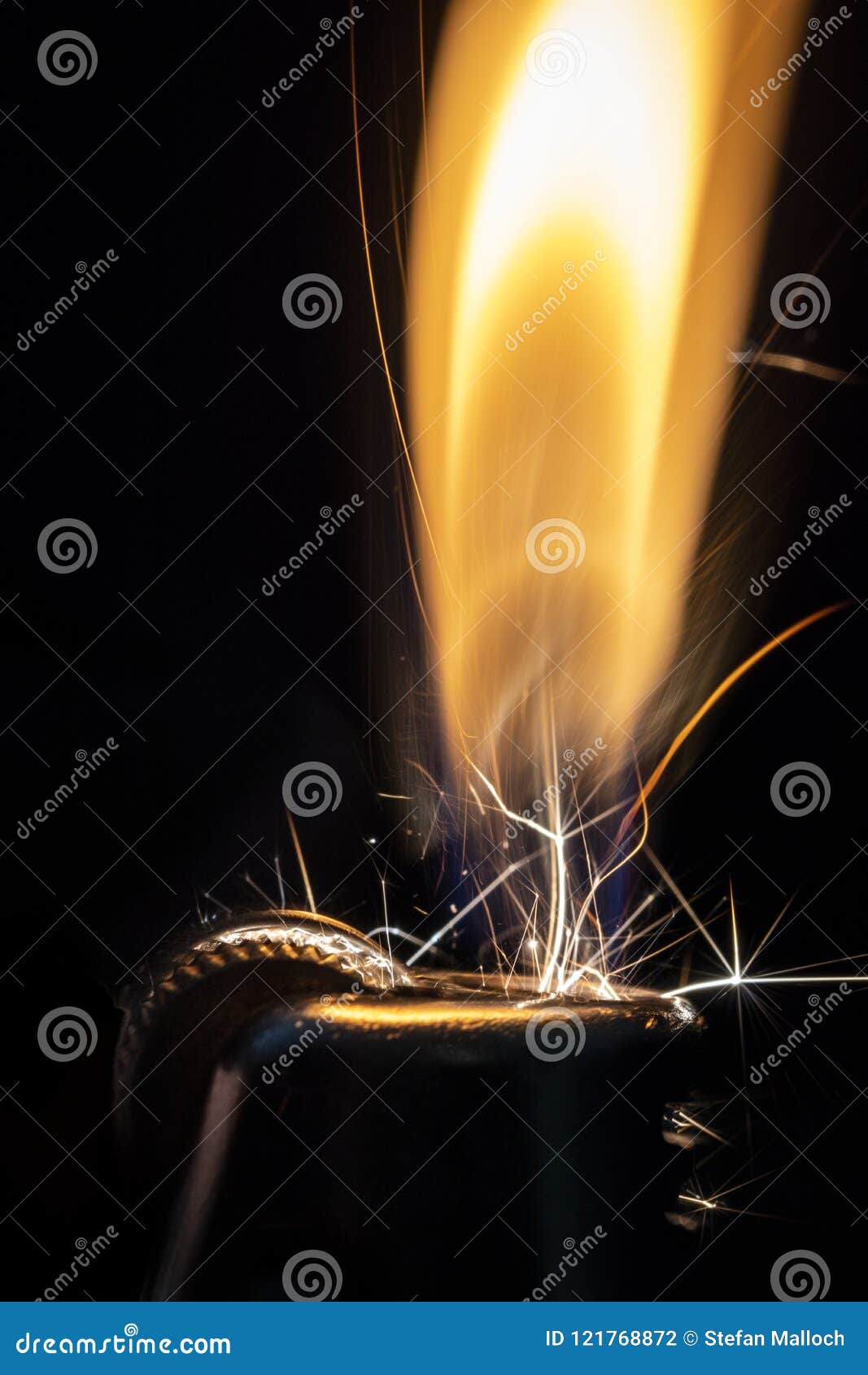 A Lighter Being Lit in the Dark Stock Photo - Image of detail, crystal ...
