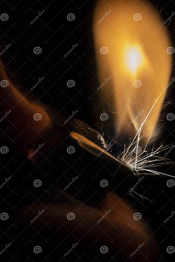 A Lighter Being Lit in the Dark Stock Image - Image of candle, closeup ...