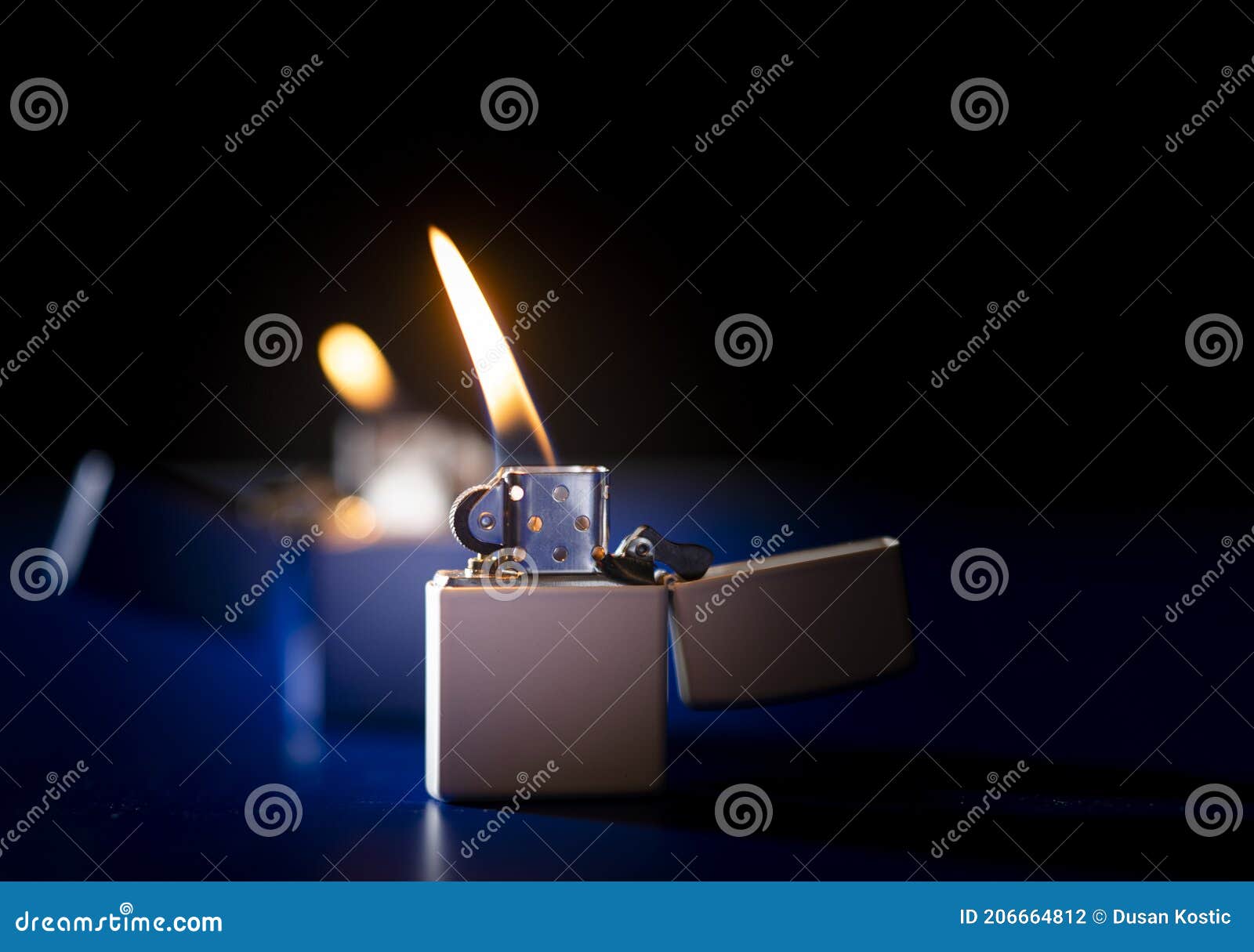 Two lighters fire closeup stock photo. Image of fire - 206664812