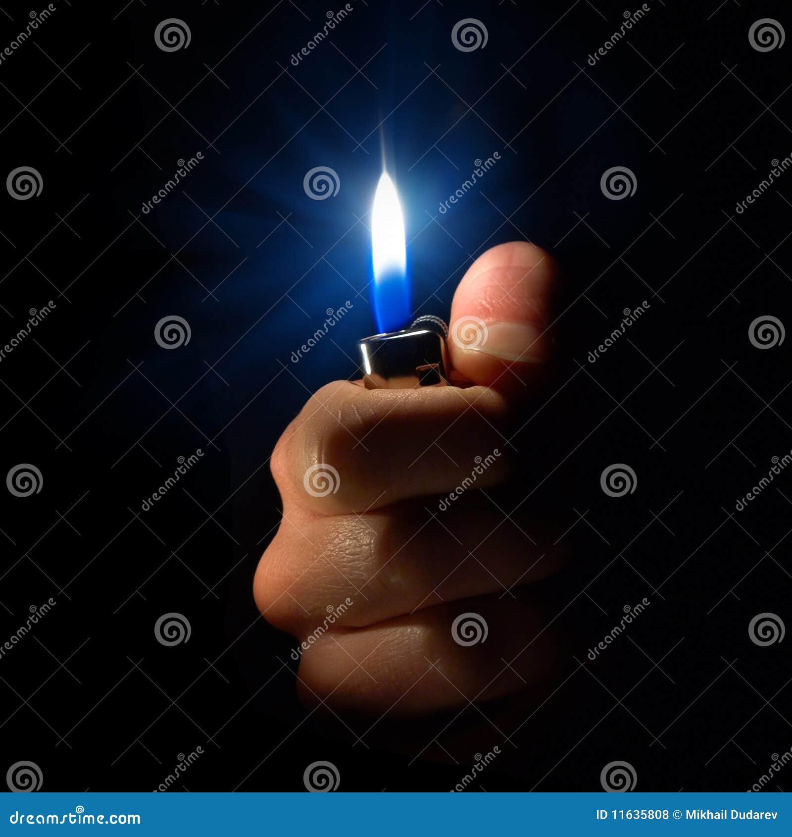 Lighter in hand stock photo. Image of blue, isolated - 11635808