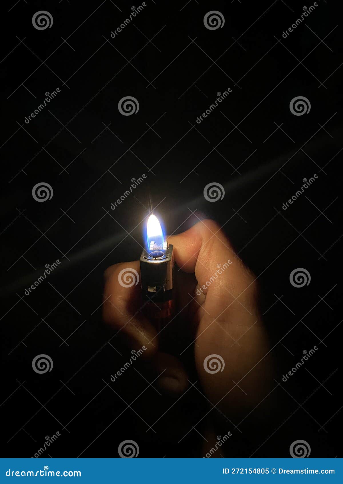 Lighter in hand stock image. Image of night, lighter - 272154805