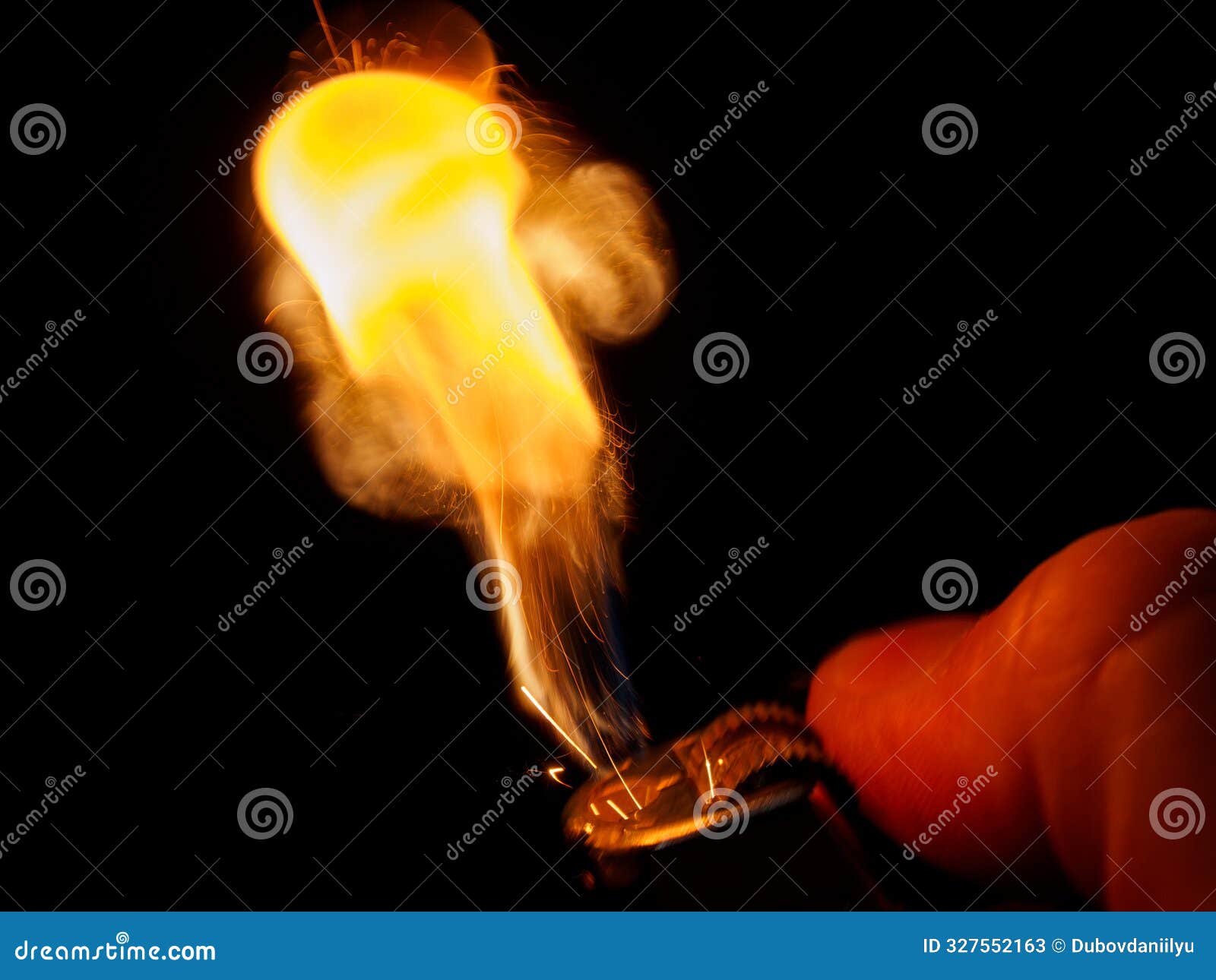 The Lighter Produces a Spark, Creating Fire. Symbol of Danger ...