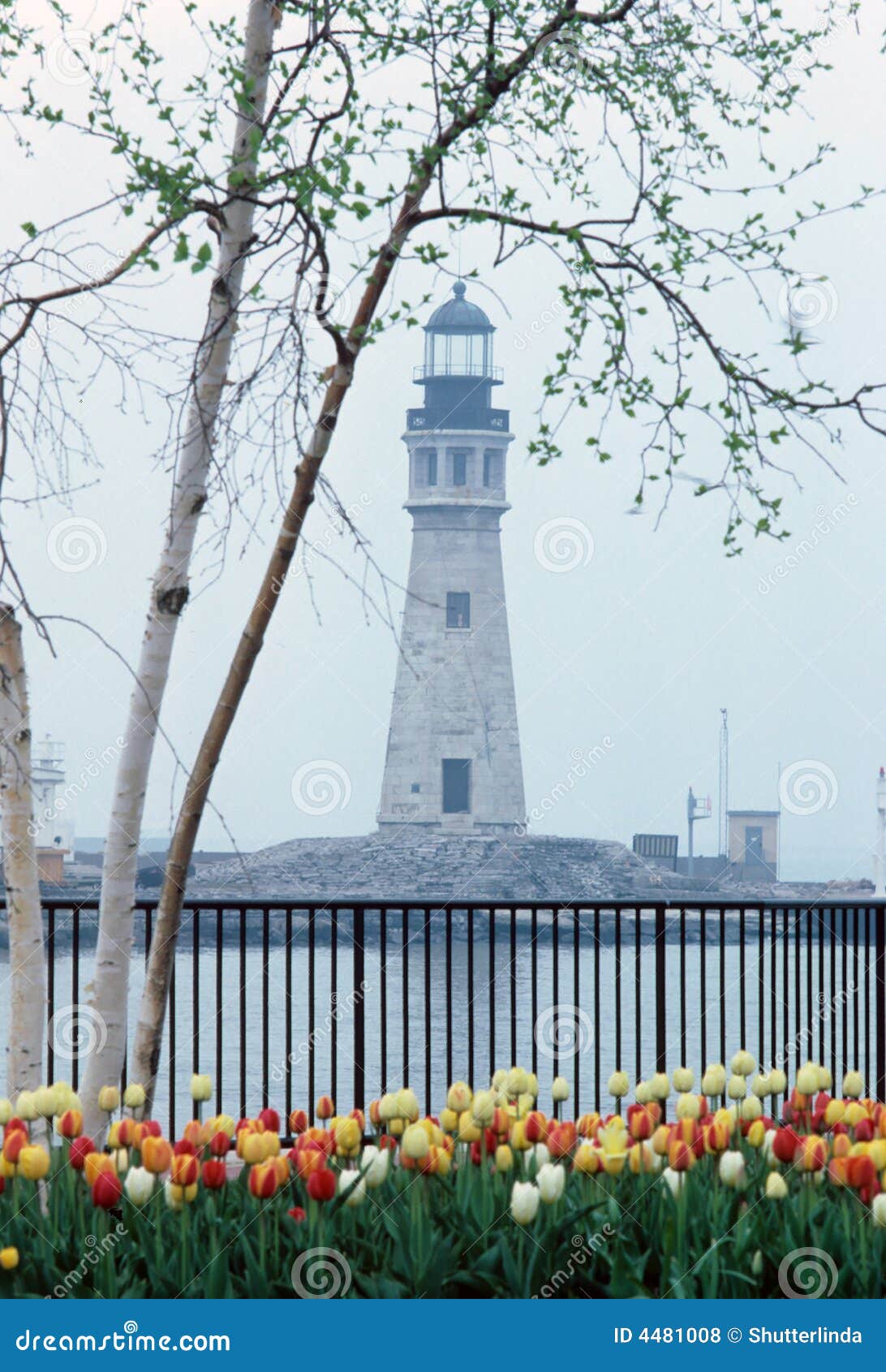 Lighthouse from afar stock photo. Image of color, sailing - 4481008