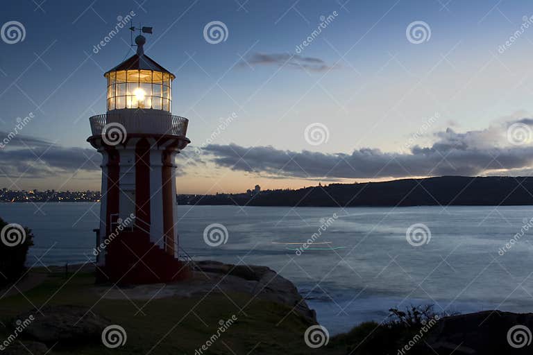 Lighthouse back down stock image. Image of clouds, coastline - 14214395