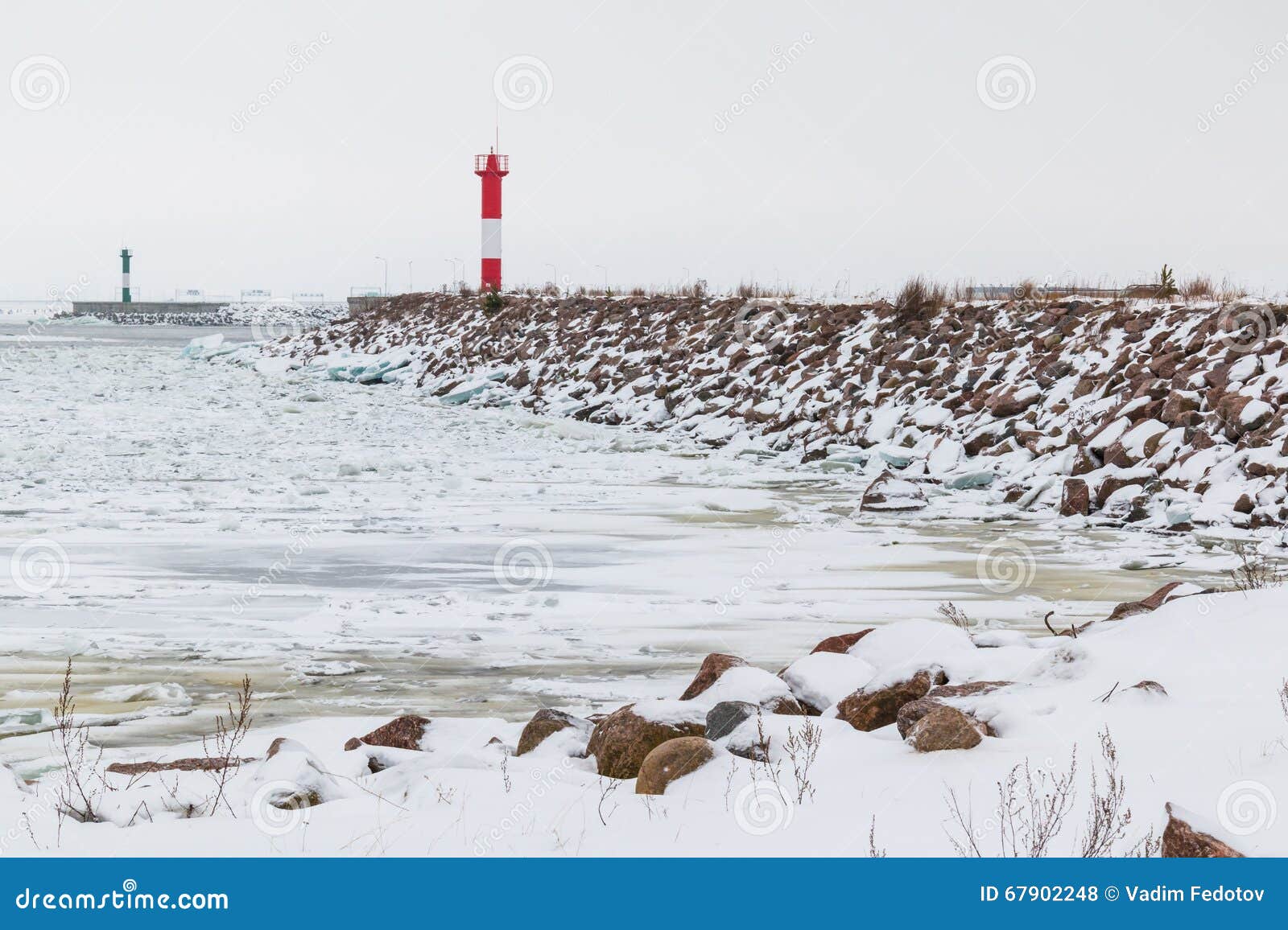 Lighthouse on the Bay in Winter Stock Photo - Image of perspective ...