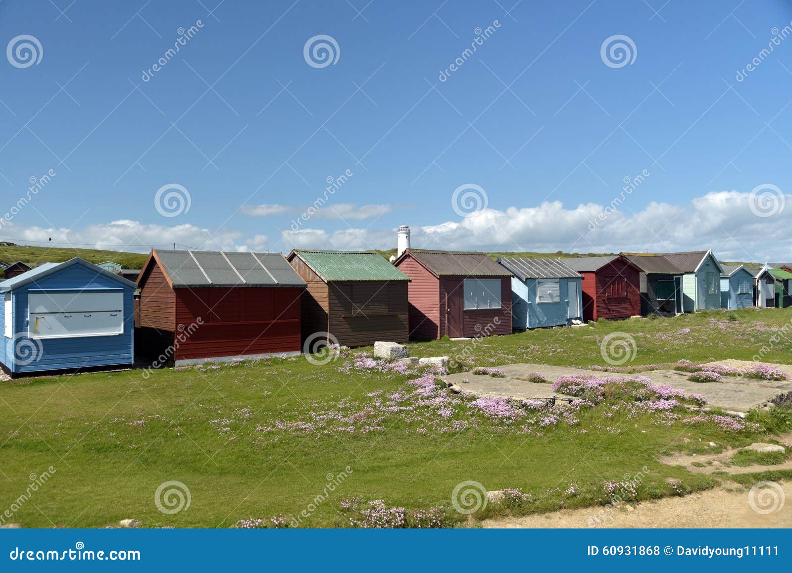 Lighthouse and Beach Huts at Portland Bill Stock Photo - Image of ...