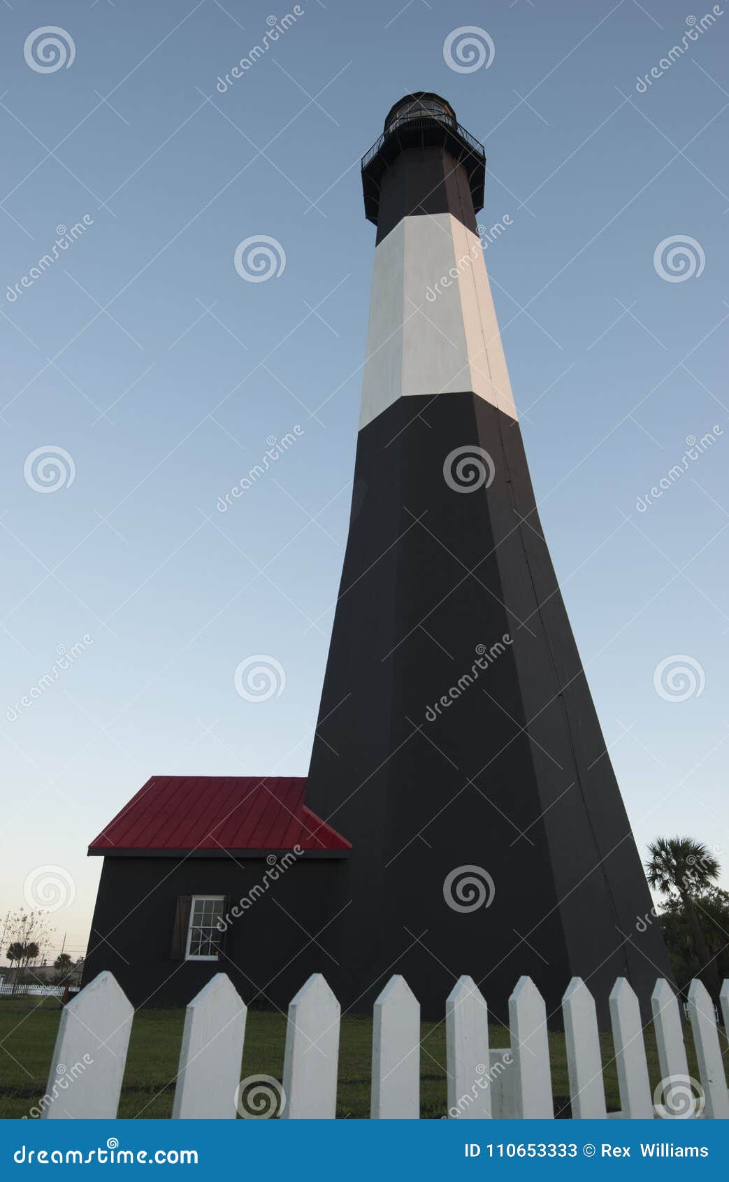 Lighthouse Beach Scene on Ocean Shore Beautiful Landscape Scene Stock ...