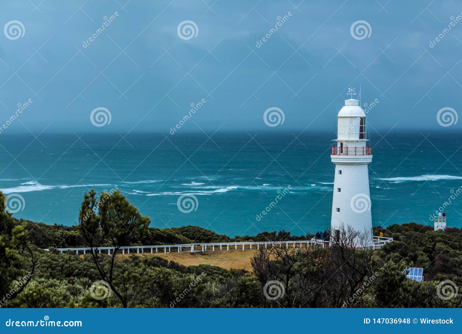 Lighthouse Beacon at the Coast of the Ocean Stock Photo - Image of ...