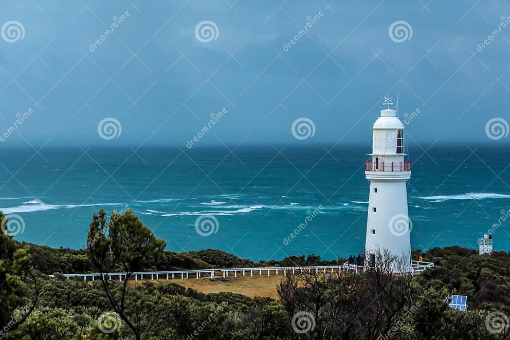 Lighthouse Beacon at the Coast of the Ocean Stock Photo - Image of ...