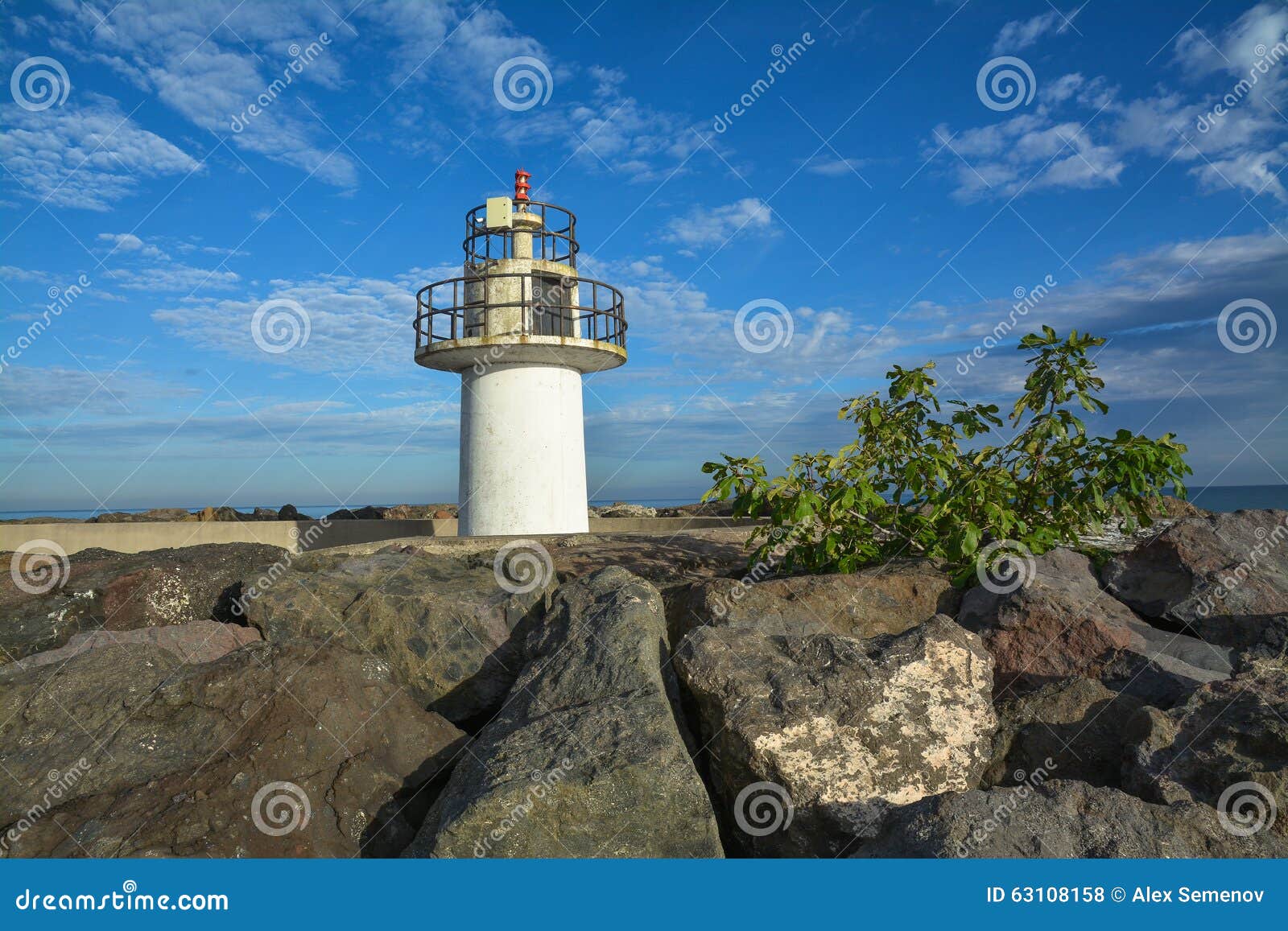 Lighthouse on Blue Sky Background Stock Photo - Image of blue, cloud ...