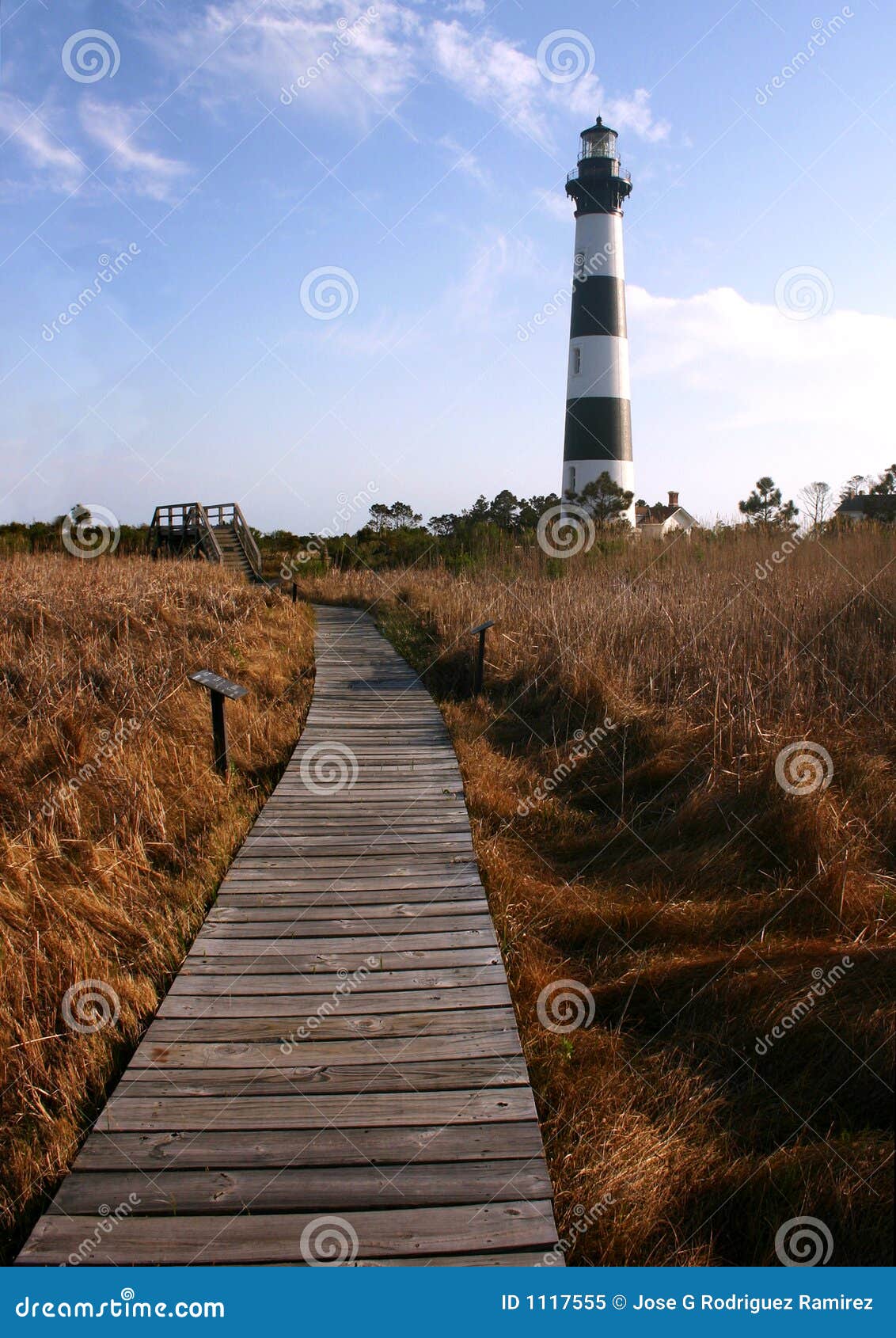 Lighthouse and Board Walk stock image. Image of marshland - 1117555
