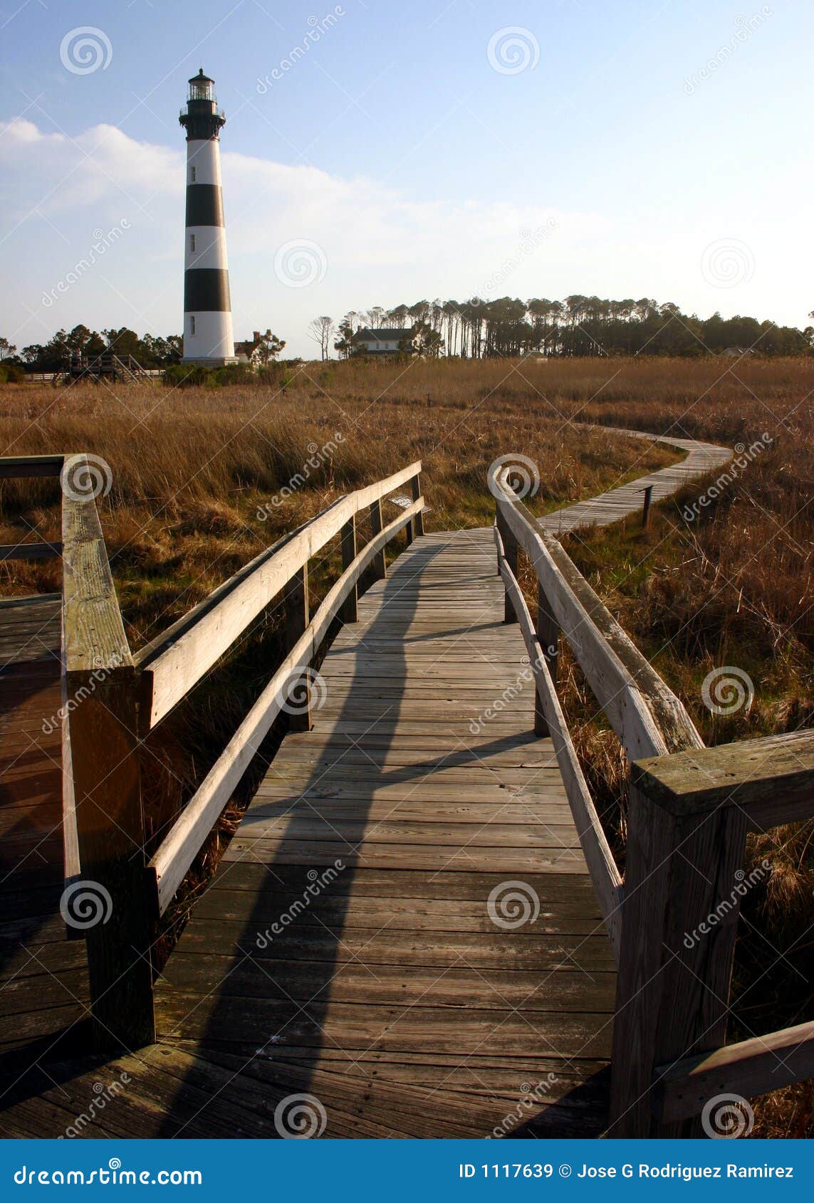 Lighthouse and Board Walk Bridge Stock Image - Image of seaside, house ...