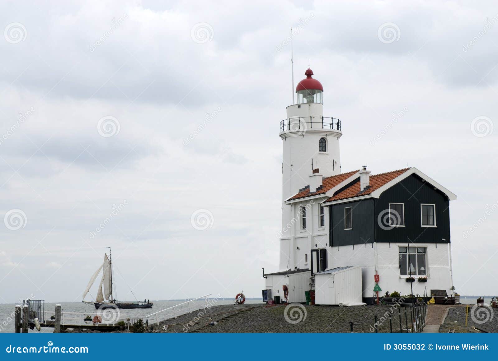 Lighthouse with boat stock photo. Image of paard, netherlands - 3055032