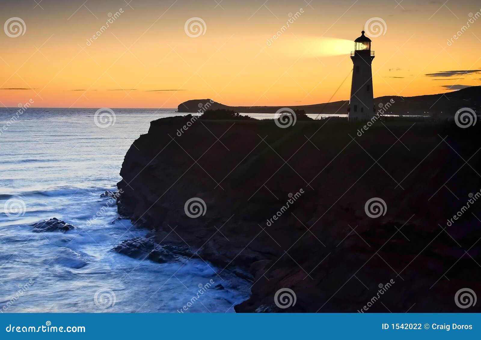 Lighthouse on Cliff stock photo. Image of evening, quebec - 1542022